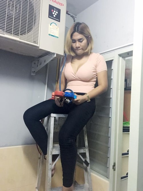 Air conditioning technician at work